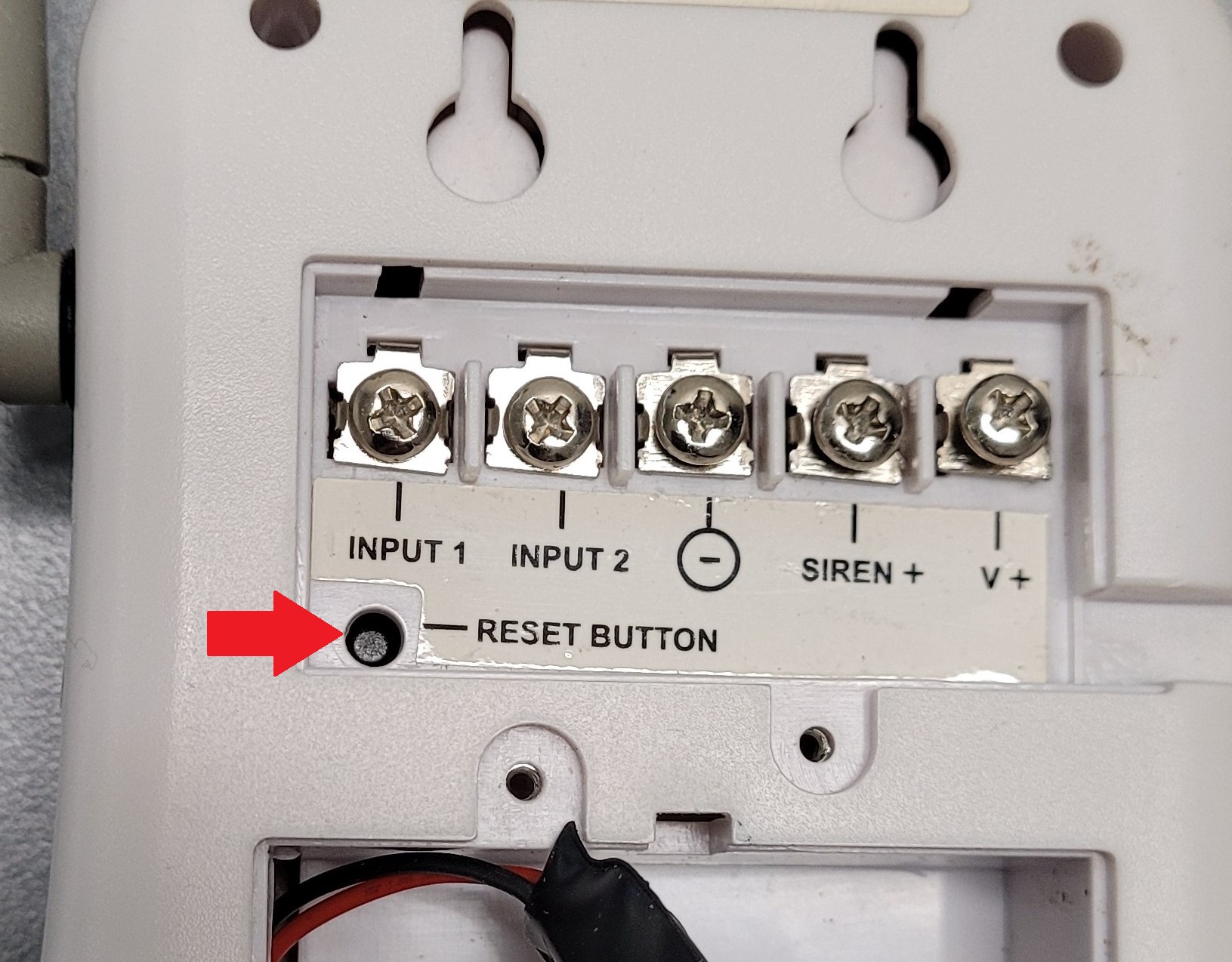 How to locate the reset button on a dialer? - Ideal Security Inc ...
